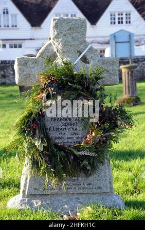 Spike Milligan's grave and headstone, with wreath, in the churchyard of ...