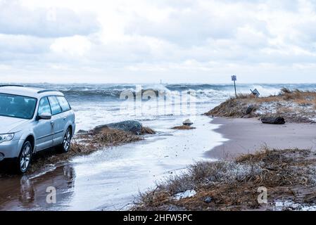 Thunder storm waves crashing on the beach Stock Photo - Alamy