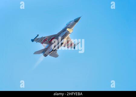 An Israeli pilot with a F-16 fighter jet in a hangar at Hatzor Israeli ...
