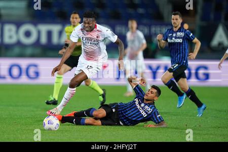 BERGAMO, ITALY - MAY 23: Franck Kessie of AC Milan and Marten de Roon ...