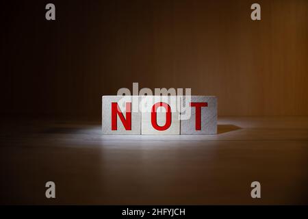 Not Ghosts, word cube with background red Stock Photo - Alamy
