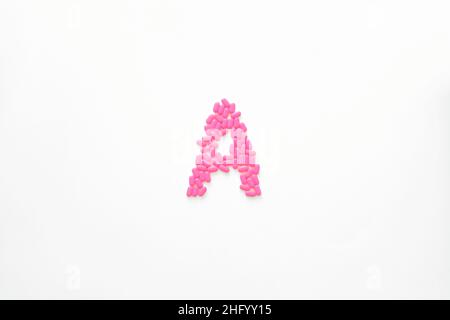 Diphenhydramine Hydrochloride pills with imprint 25 L479 on a white ...