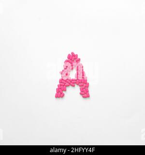 Diphenhydramine Hydrochloride pills with imprint 25 L479 on a white ...