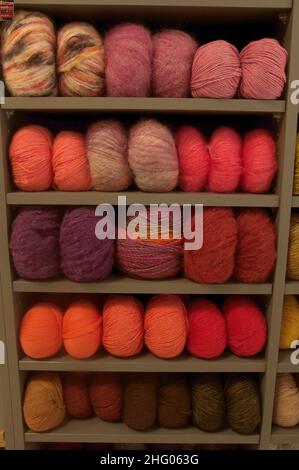 Colourful balls of wool on shelves Stock Photo - Alamy