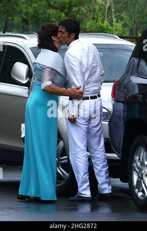 Italian footballer Gigi Buffon and his family attending the wedding of ...