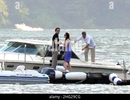 George Clooney is seen on a boat with friends returning to his villa on ...
