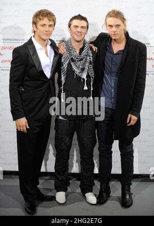 Charlie Bewley (L), Cameron Bright (C) and Jamie Campbell Bower arrive ...