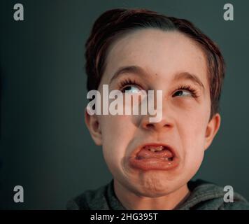 Close up photo of boy crying Stock Photo - Alamy