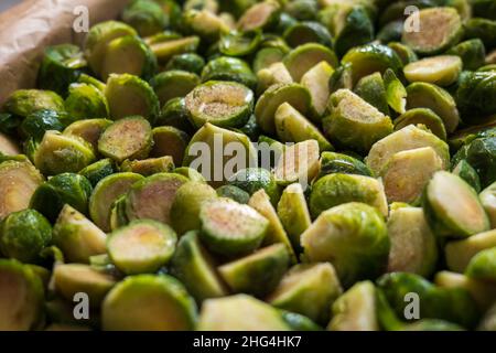 frozen sliced brussels sprouts on baking tray closeup Stock Photo - Alamy