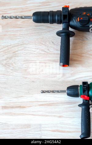 rotary hammer and a drill. percussion and drilling tools Stock Photo ...