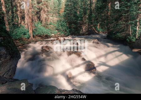 Photograph of fast moving rapids in a fresh water river in the ...