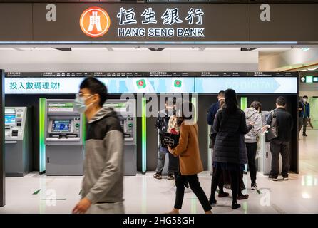 Customers withdraw money ATM machines from the Chinese state-owned ...