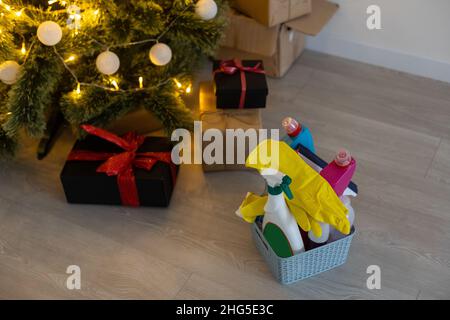 Cleaning before Christmas. Multicolored cleaning supplies. Sponges ...
