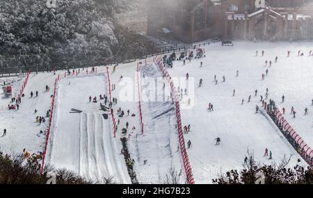 CHONGQING, CHINA - JANUARY 17, 2022 - People enjoy snow and ice sports ...