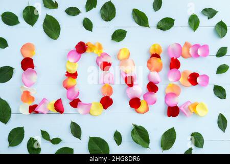 Word rose made out of rose petals Stock Photo - Alamy