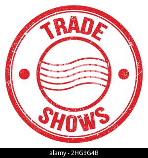 TRADE SHOWS text written on pink-black dash stamp sign Stock Photo - Alamy