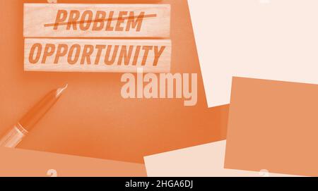 Problem crossed out and opportunity on wooden blocks. Business startup ...