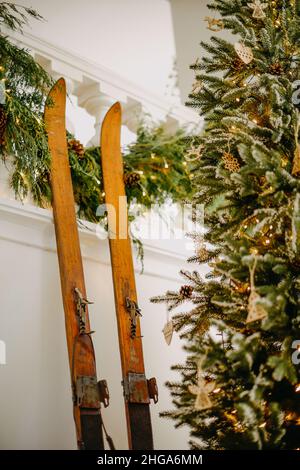 New year 2022, christmas. House room decorated for the holidays. A sofa ...