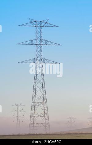 Installation and assembly of high-rise electrical towers Stock Photo ...