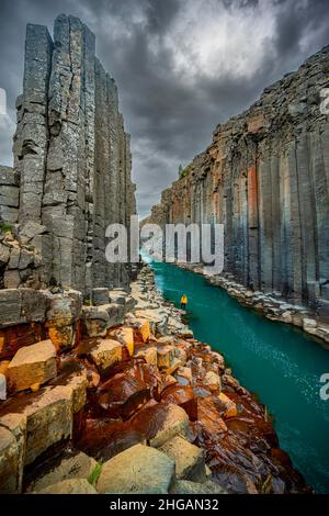 Tourist at Stuolagil Canyon, basalt columns, Egilsstadir, Iceland Stock ...