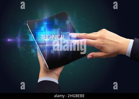 Businessman holding a foldable smartphone with TECHNICAL SUPPORT ...