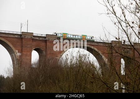 17 January 2022, Saxony, Barthmühle: The Elster Valley Bridge. Water is ...