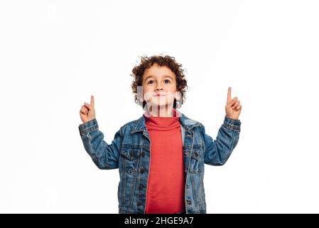 Young boy indicating something isolated on a white background Stock ...