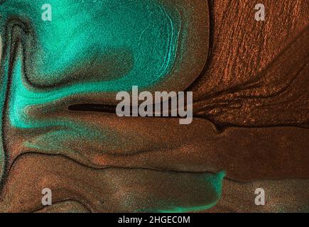 Abstract background from shimmer nail lacquer,chocolate and turquoise ...