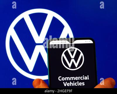 In this photo illustration, the Volkswagen Commercial Vehicles logo is ...