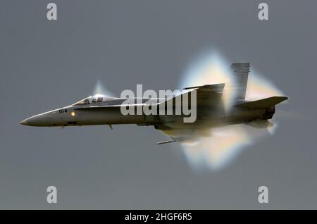 Shock wave created around a Swiss Air Force McDonnell Douglas Hornet ...