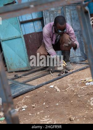 Street welding business, window frames in Kenya, Africa Stock Photo - Alamy
