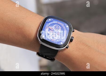 SURABAYA, EAST JAVA - January 15, 2021: selective focus, man hand with ...