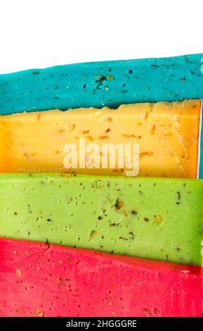 Gouda cheese with green pesto Stock Photo - Alamy