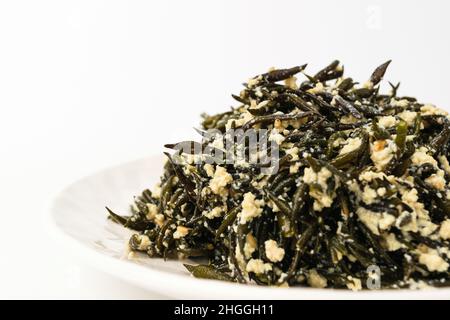 Sea weed fusiforme herb on white background Stock Photo - Alamy