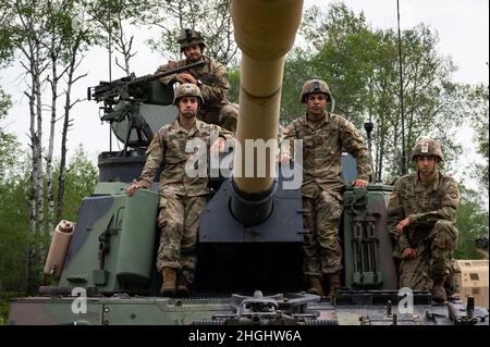 U.S. Army Sgt. Dylan Istre, a canon crew gunner, from the 1st Battalion ...