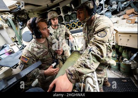 U.S. Army Sgt. Dylan Istre, a canon crew gunner, from the 1st Battalion ...