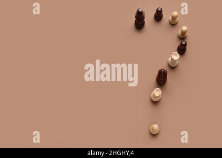 Question mark made of chess pieces on red background Stock Photo - Alamy