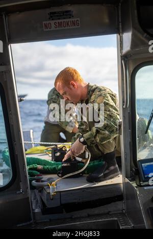 Navy Diver 3rd Class Aiden Lockard, assigned to Mobile Diving Salvage ...
