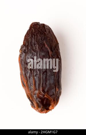 One tasty dried date isolated on white Stock Photo - Alamy