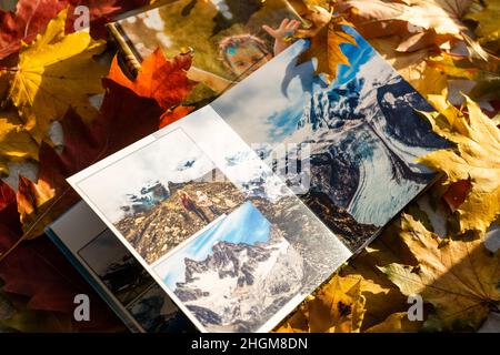 photobook album and yellow leaves Stock Photo - Alamy