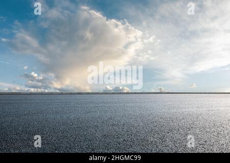 Highway wide road, transport and blue sky with clouds on a summer day ...