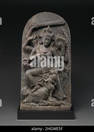 Eight armed Durga slaying the demon Mahisha. Dieng Plateau, Wonosobo ...