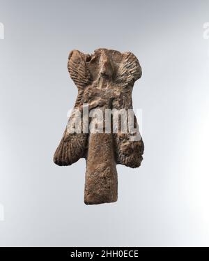 Stone carved eagle headed winged figure, Assyrian Palace, Nimrud, Iraq ...