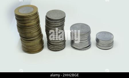Ten rupees coin pile isolated on white background with clipping path ...