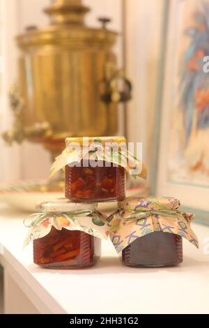Assorted jams on the table in the kitchen Stock Photo - Alamy