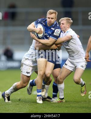 Aaron Reed #23 of Sale Sharks breaks past Max Ojomoh #12 of Bath Rugby ...