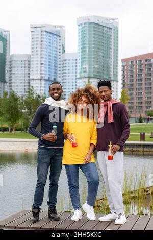 front view three juice bottles with cap. High quality and resolution ...