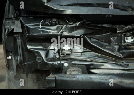 After accident car detailing. Fender varnishing. Arm holding paint ...