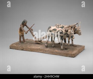 Ancient Egyptian wooden model of a man cooking a duck, New Kingdom, 11 ...