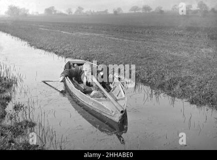 Snowden Slights with dog in punt YORYM S23 Stock Photo - Alamy